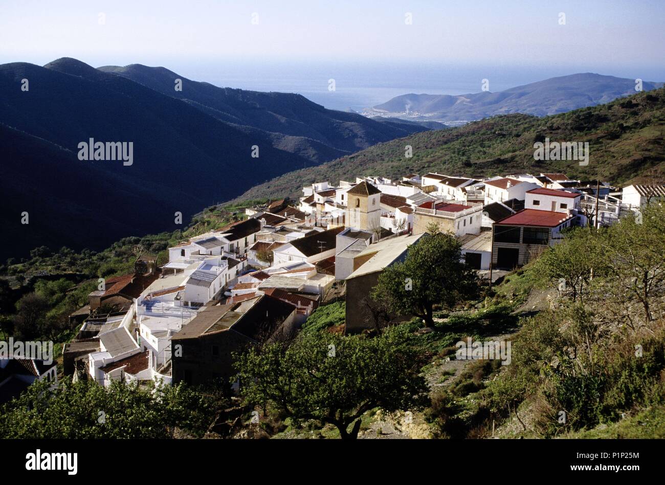 Rubite, town, mountain landscape and Mediterranean see (Baja Alpujarra ...