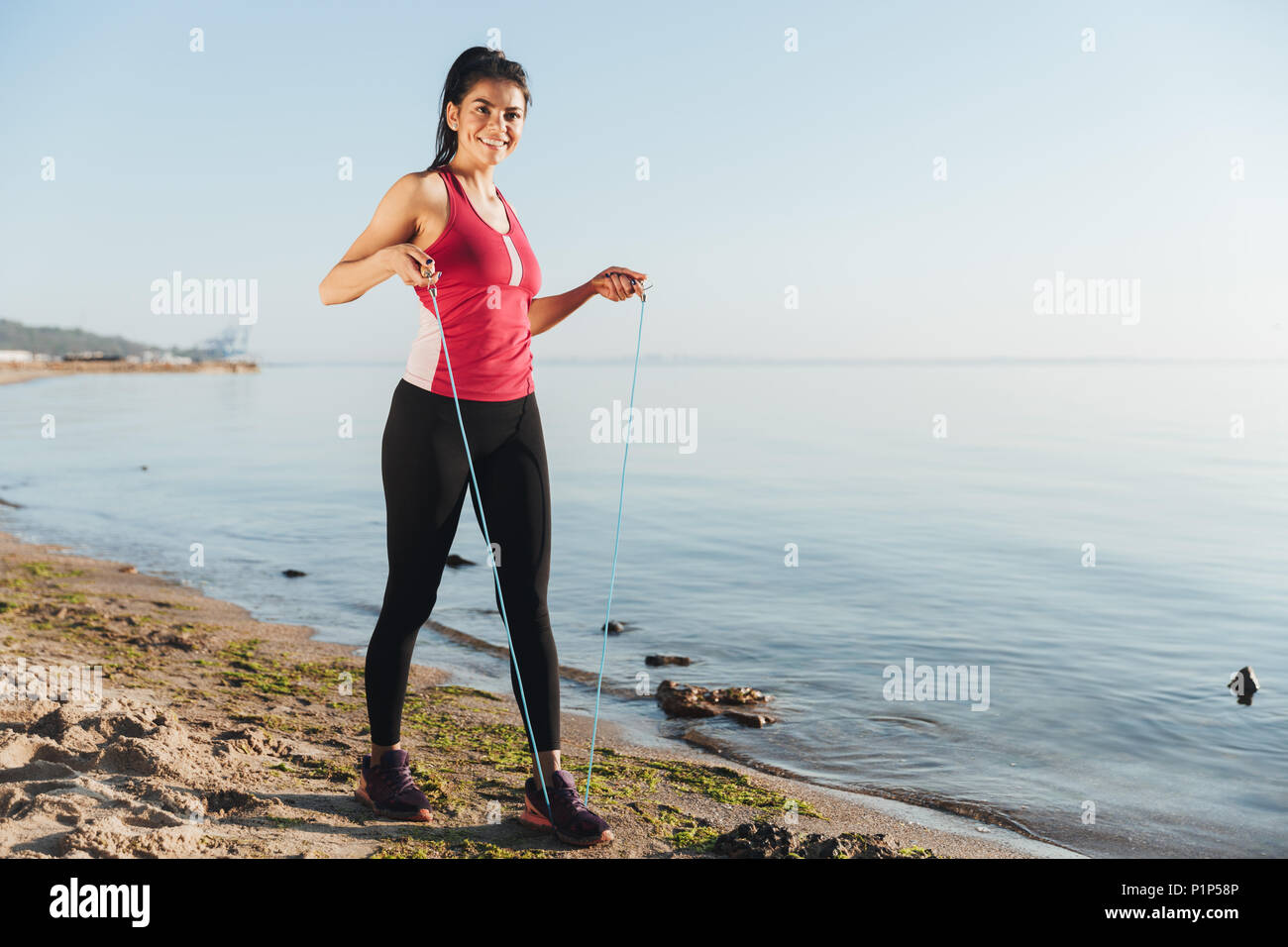 Woman Skipping At The Beach High Resolution Stock Photography and ...