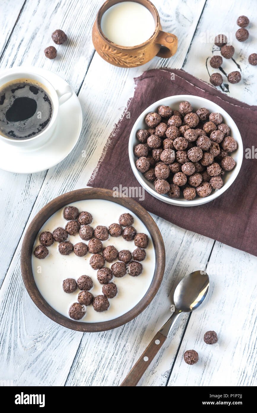 Bowl of chocolate corn balls with milk Stock Photo - Alamy