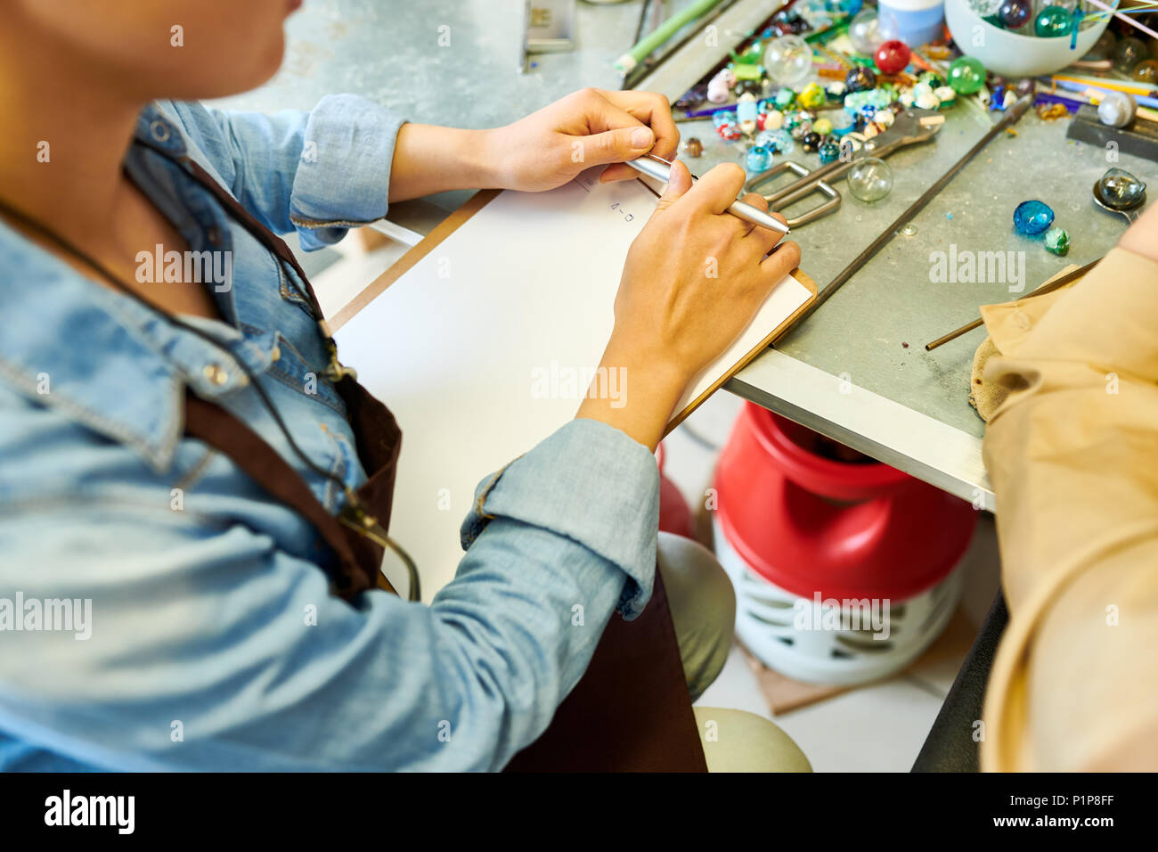 Female Artist Making Notes Stock Photo - Alamy