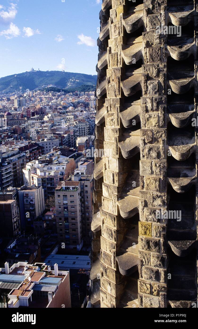 Sagrada Familia (Gaudí); tower and city Stock Photo - Alamy