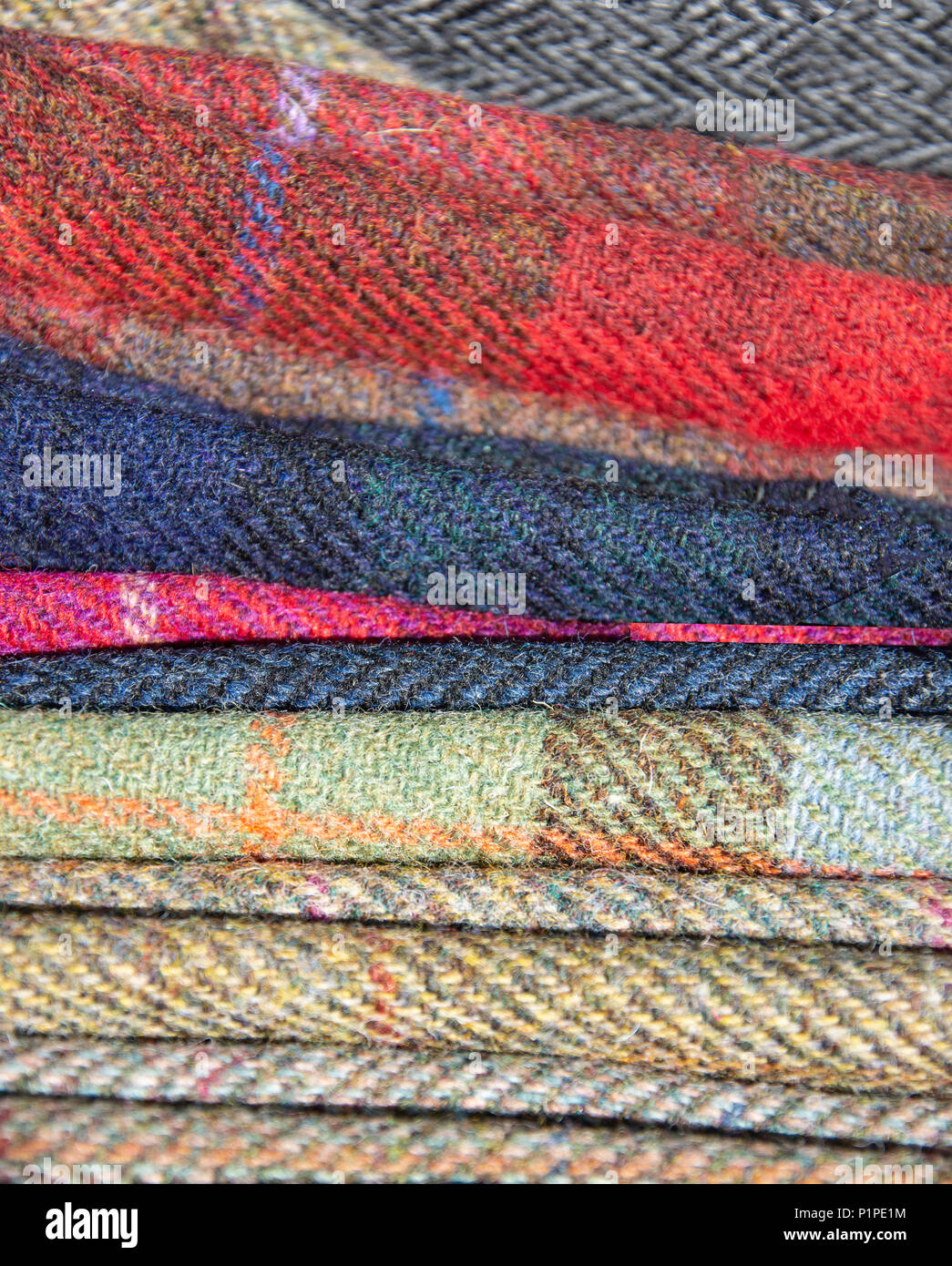 Pile of harris tweed garments western isles tarbert tairbeart is hi-res ...