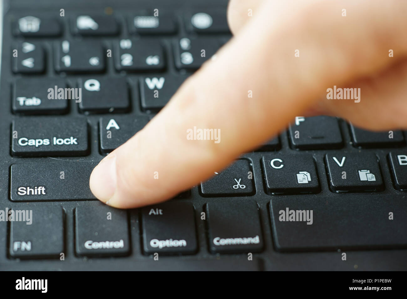 Finger on Keyboard Stock Photo - Alamy