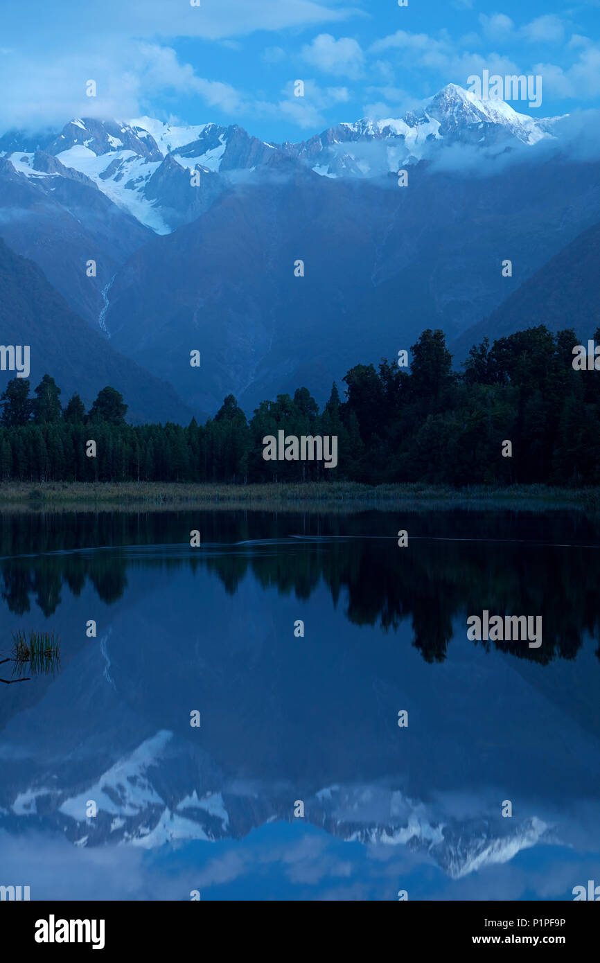 Summits of Mt Tasman (left) and Aoraki / Mt Cook (right) reflected in ...