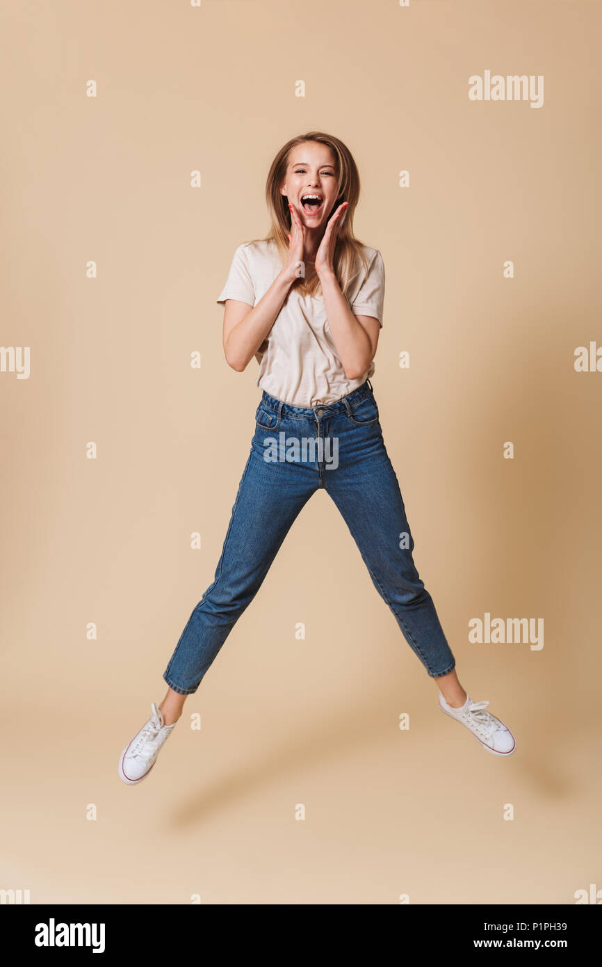 Attractive young woman clapping hands hi-res stock photography and ...