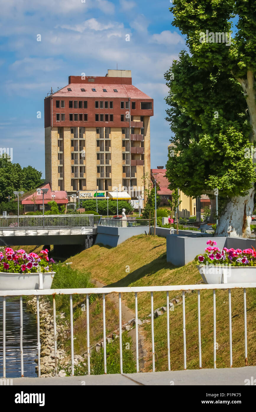 VUKOVAR, CROATIA - MAY 14, 2018 : View of flowers and pedestrian bridge ...