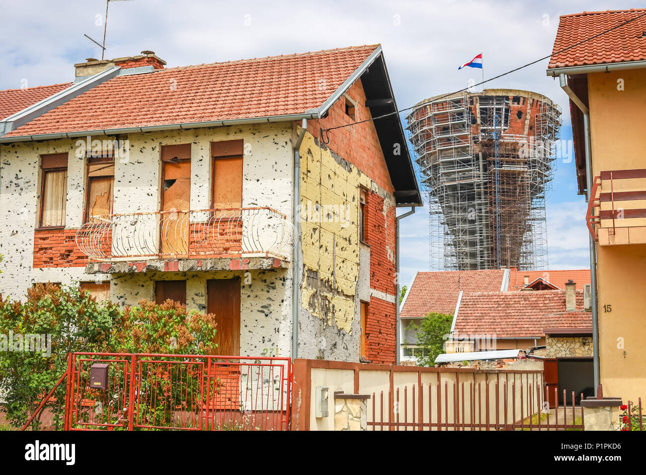 VUKOVAR, CROATIA - MAY 14, 2018 : A view of a house damaged in war with ...