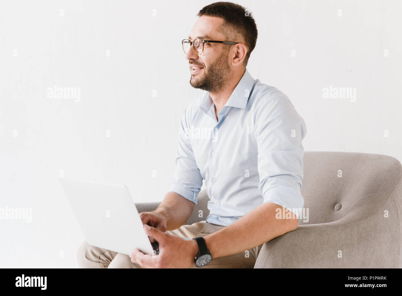 Bearded guy using laptop workplace hi-res stock photography and images ...