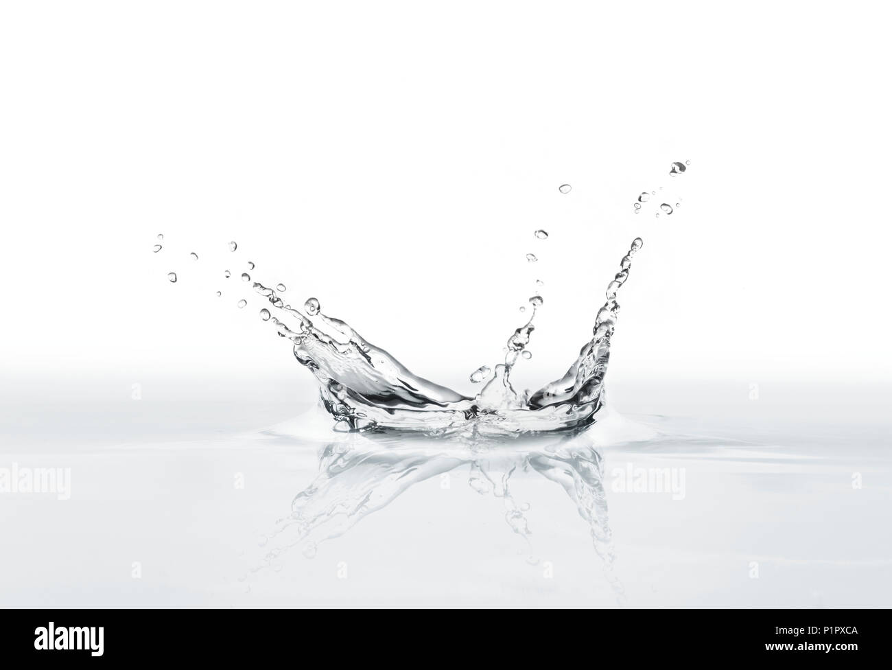 Water droplet splashing on a surface Stock Photo - Alamy