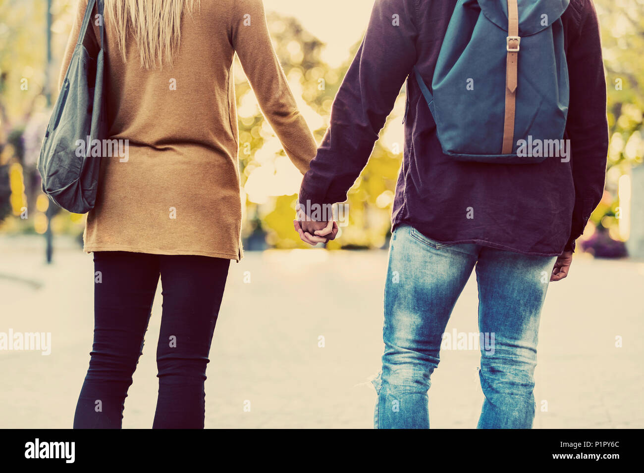 Girlfriend And Boyfriend Holding Hands Sunset