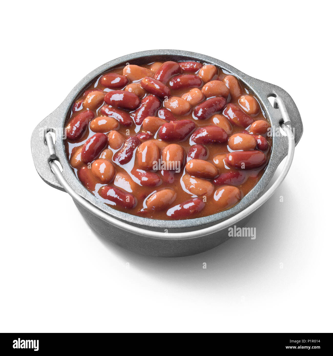 Baked beans in a metal pot with handle against a white background Stock ...