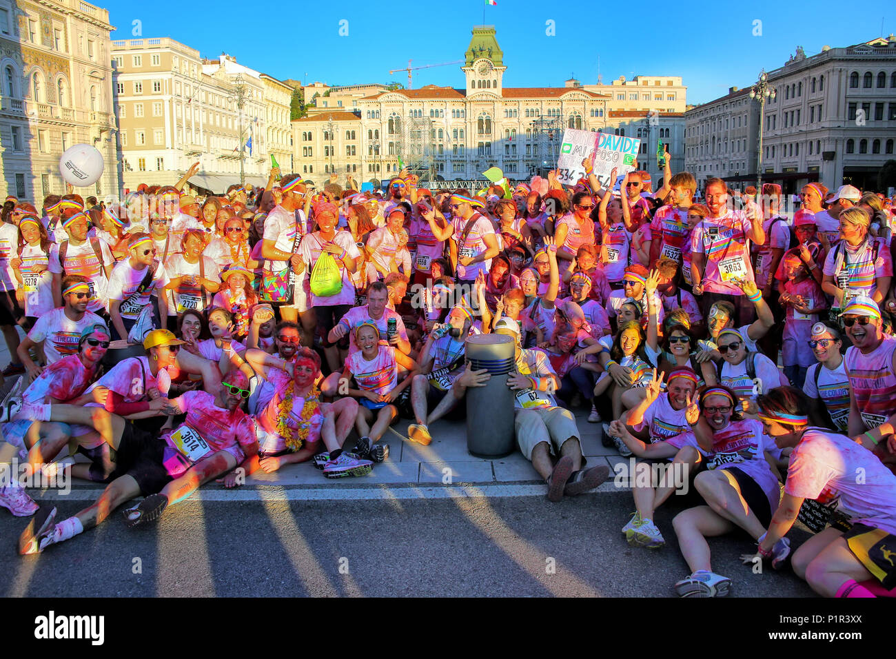 People posing for photos during The Color Run in Trieste, Italy ...