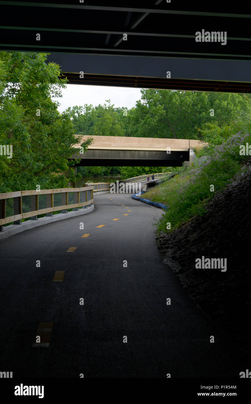 Dark path under highways Stock Photo - Alamy