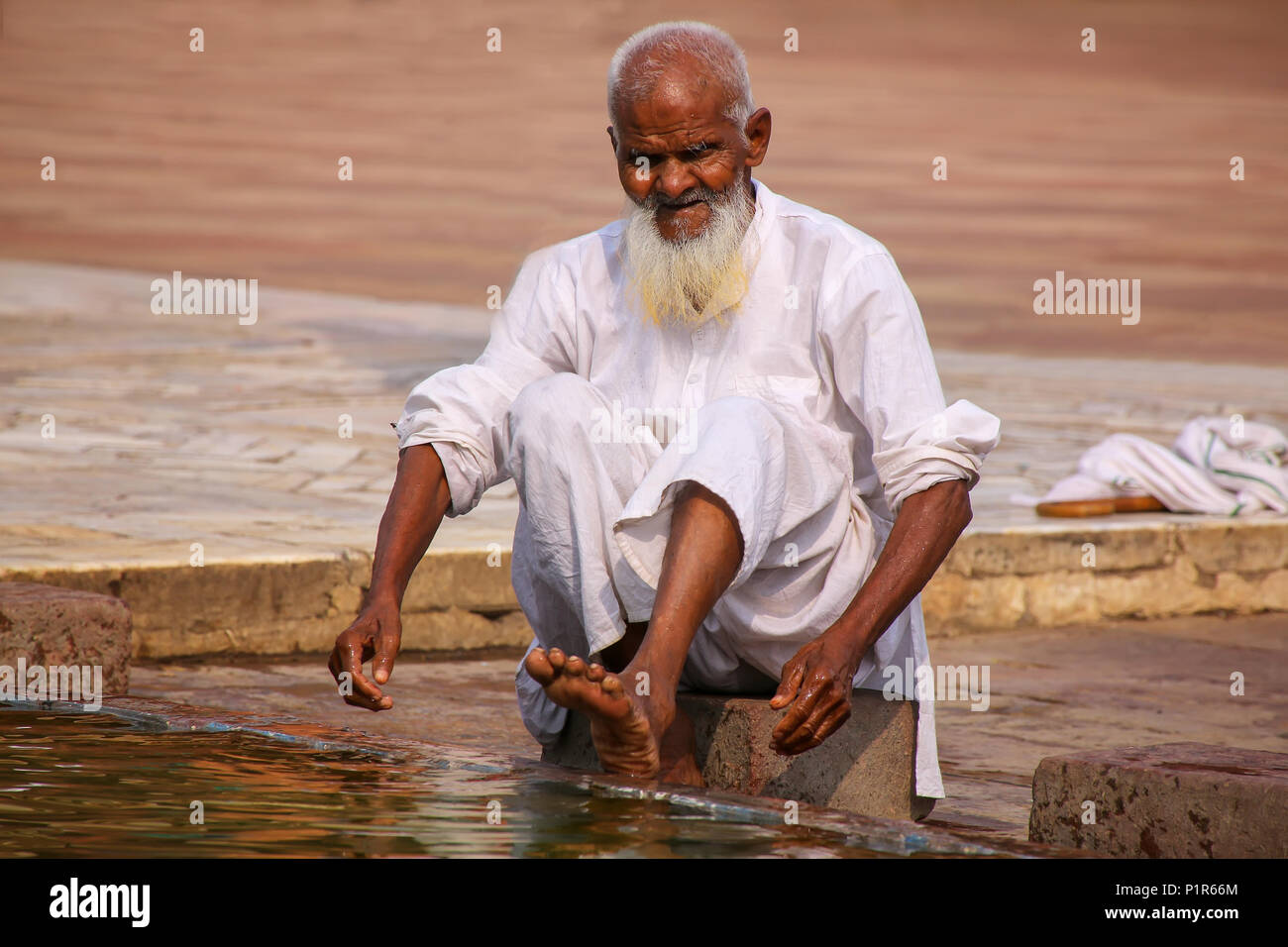 Man washing his feet hi-res stock photography and images - Alamy