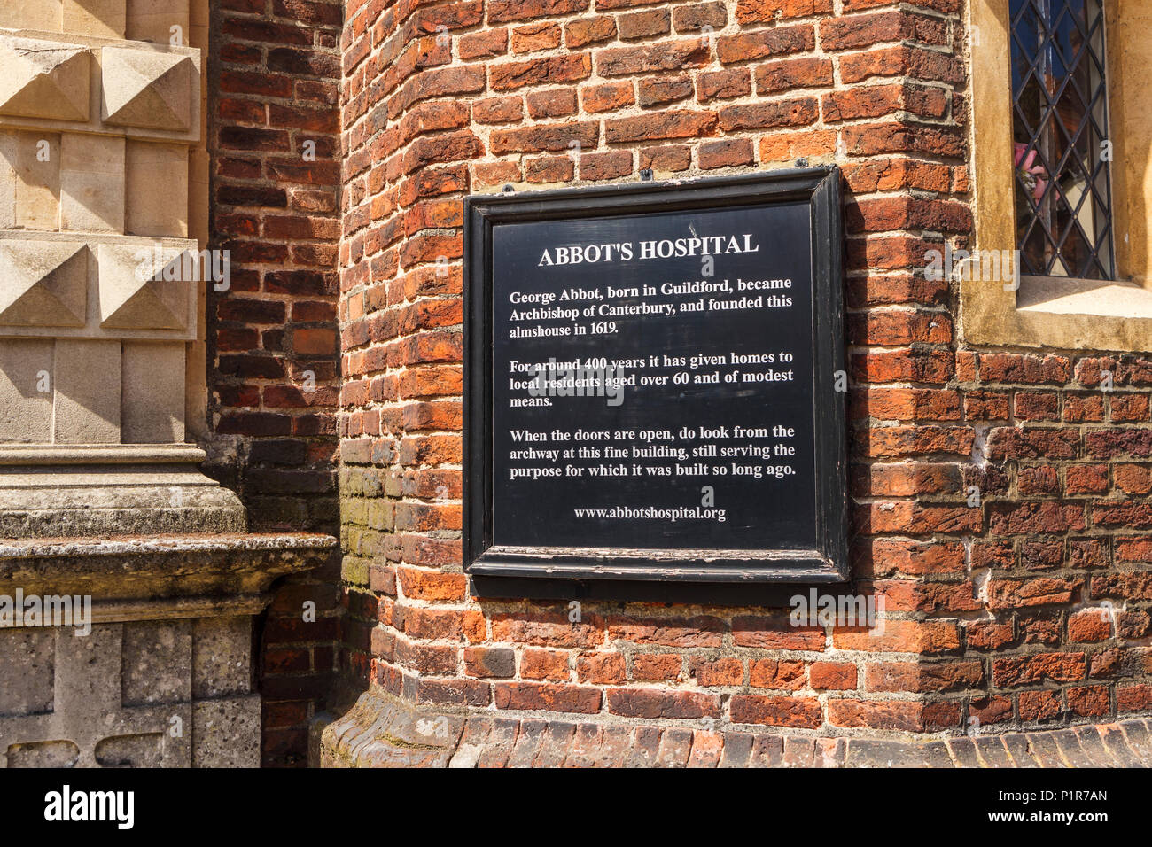 Sign at the entrance to Abbot's Hospital, a landmark almshouse ...
