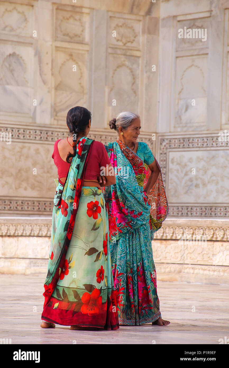 Women standing outside Taj Mahal in Agra, Uttar Pradesh, India. Taj ...