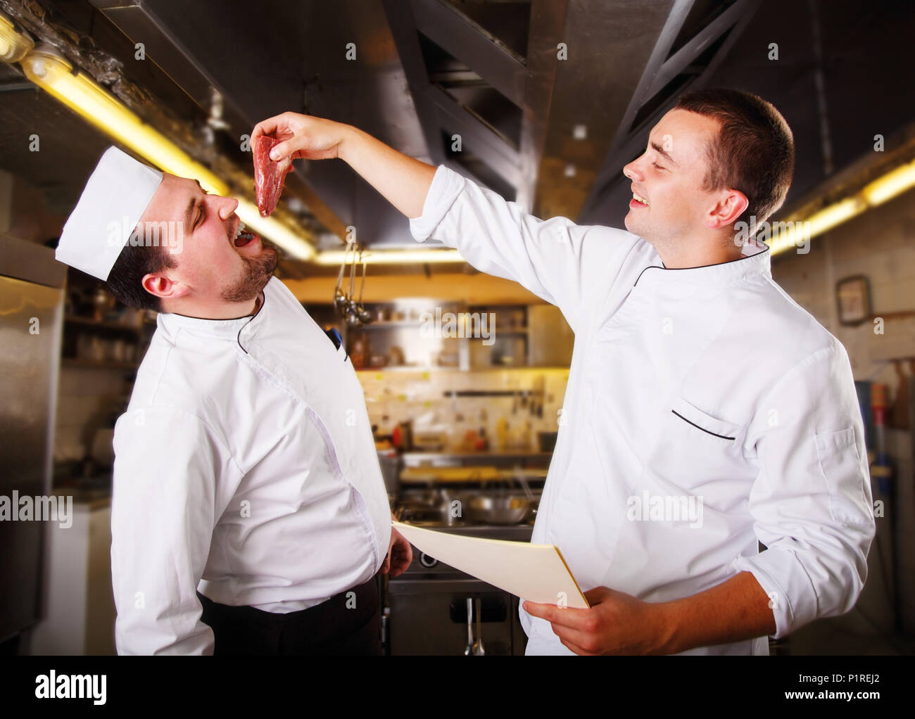 Chefs have fun Stock Photo - Alamy