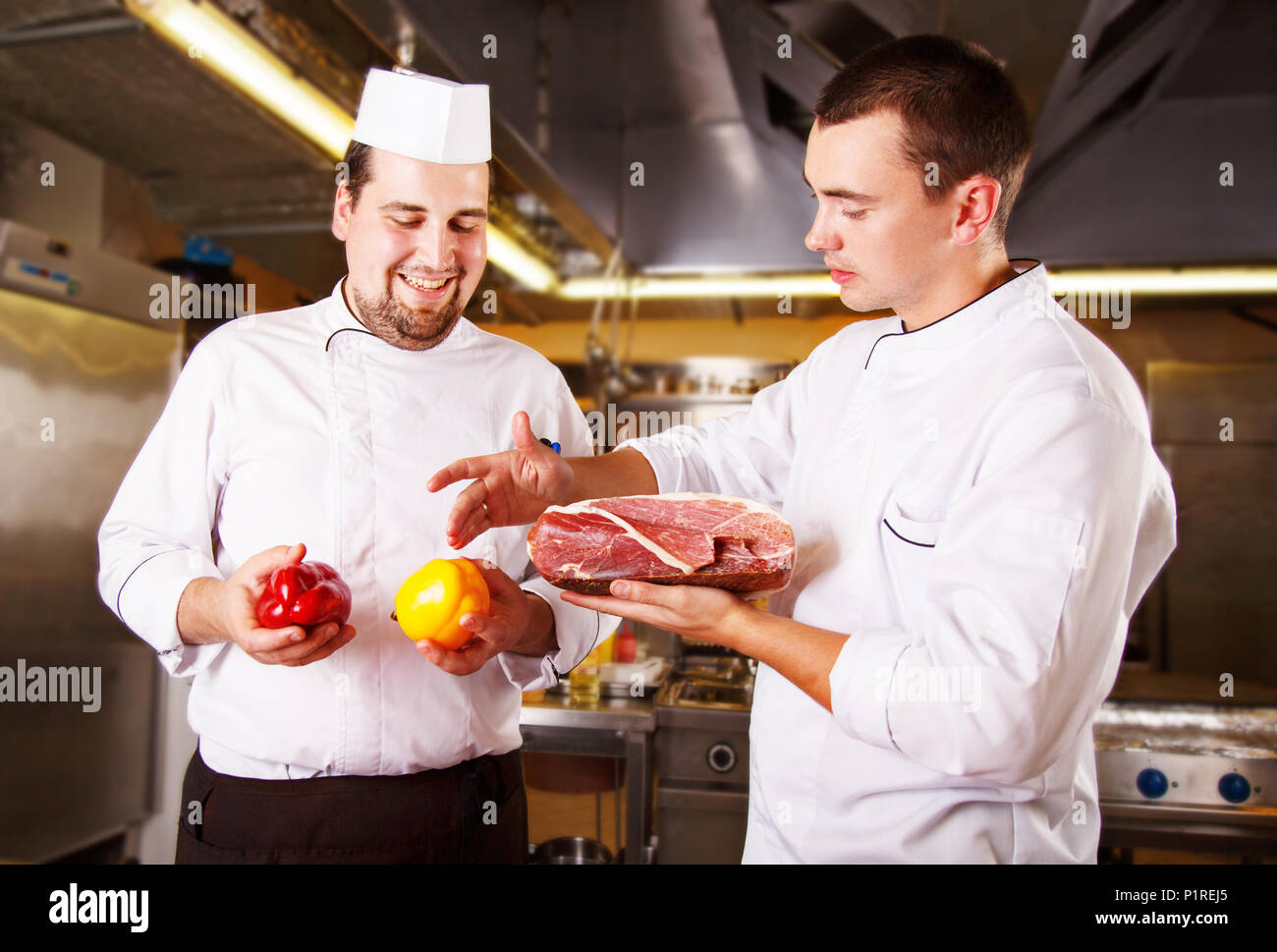 Two young male chefs restaurant hi-res stock photography and images - Alamy