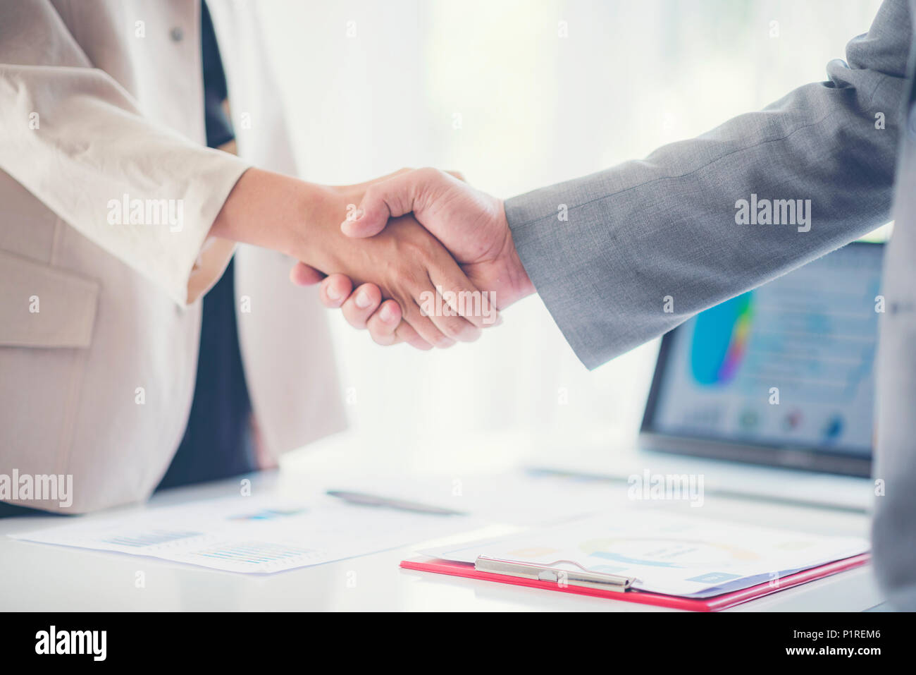Teamwork business concept.Close up view of group of coworkers join hand together during their ...