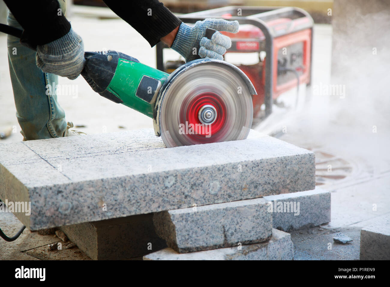 Worker with angle grinder Stock Photo - Alamy
