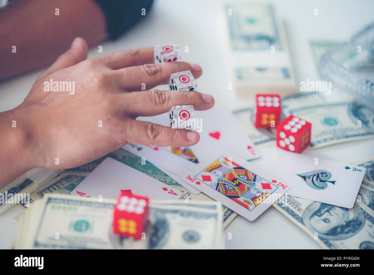 Businessman throwing dice hi-res stock photography and images - Alamy