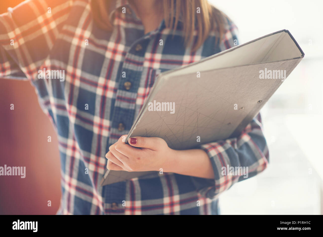 Businessmen presenting works with portfolio Stock Photo - Alamy