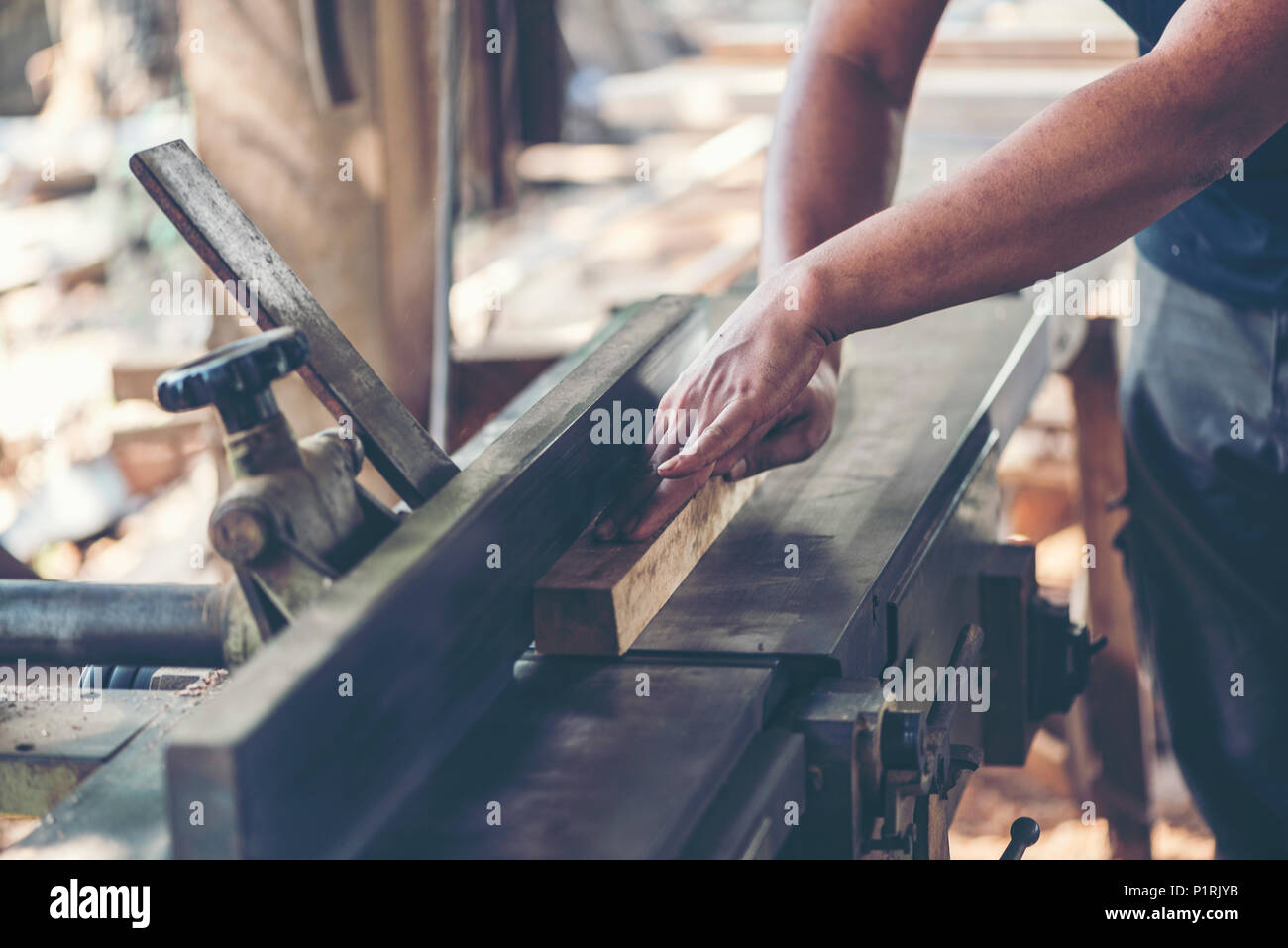 Background image of woodworking workshop: carpenters work table with ...