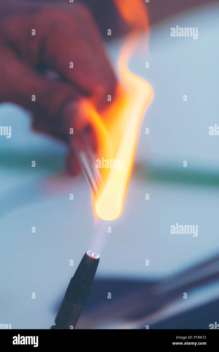 Industry steel, Background peeling of slab, Flakes flame by blowing gas ...
