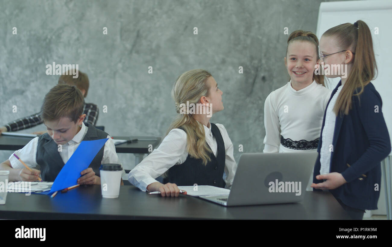Business children working hard in office Stock Photo - Alamy