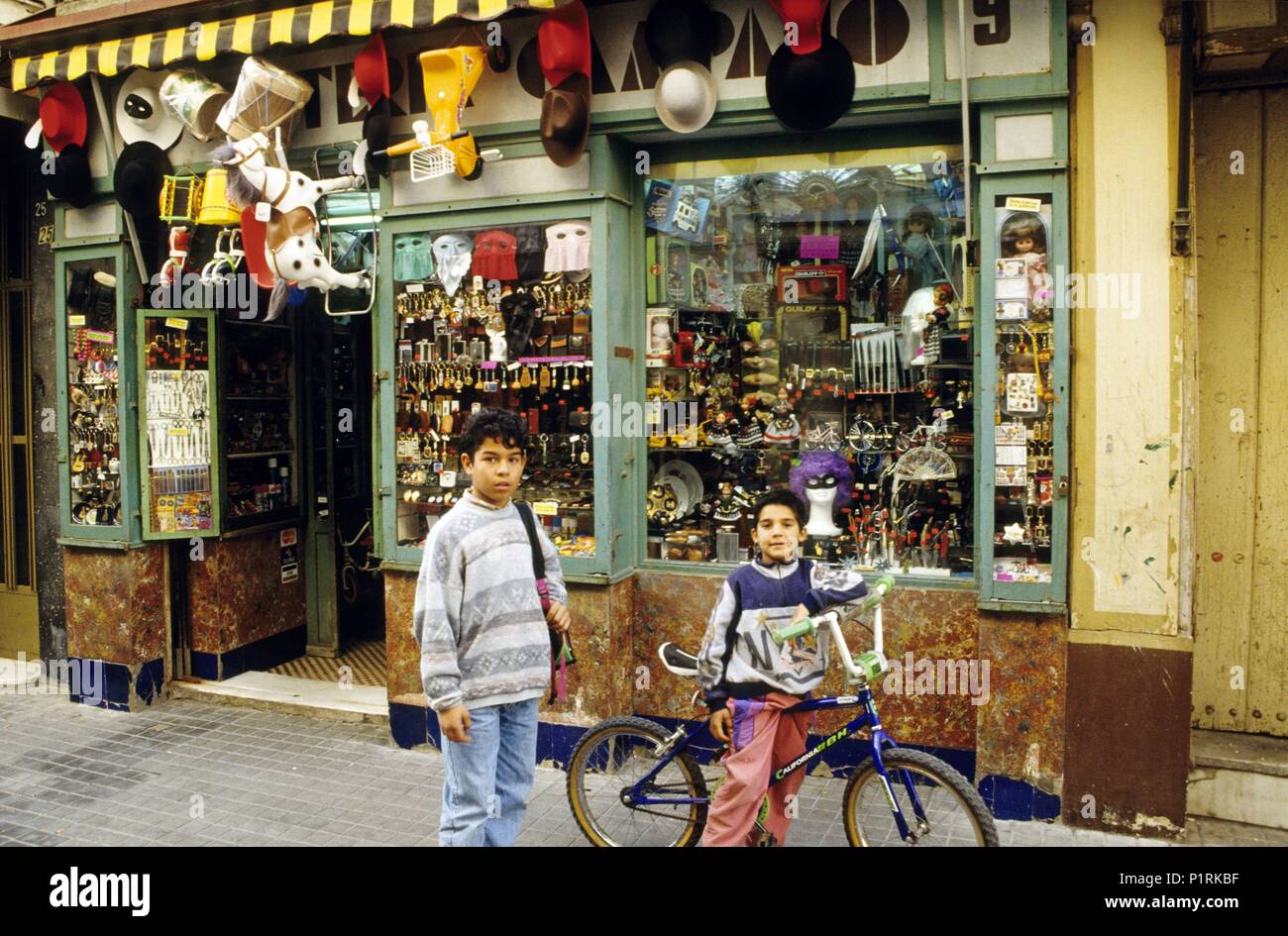 Old city; toystory in San Juan street and gipsy boys Stock Photo - Alamy