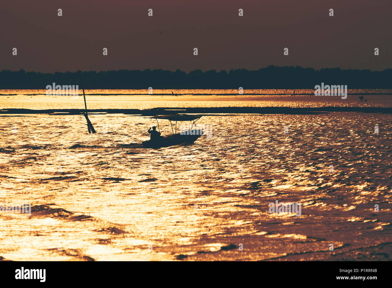 local fishing boat with sunset, in Thailand ocean Stock Photo - Alamy
