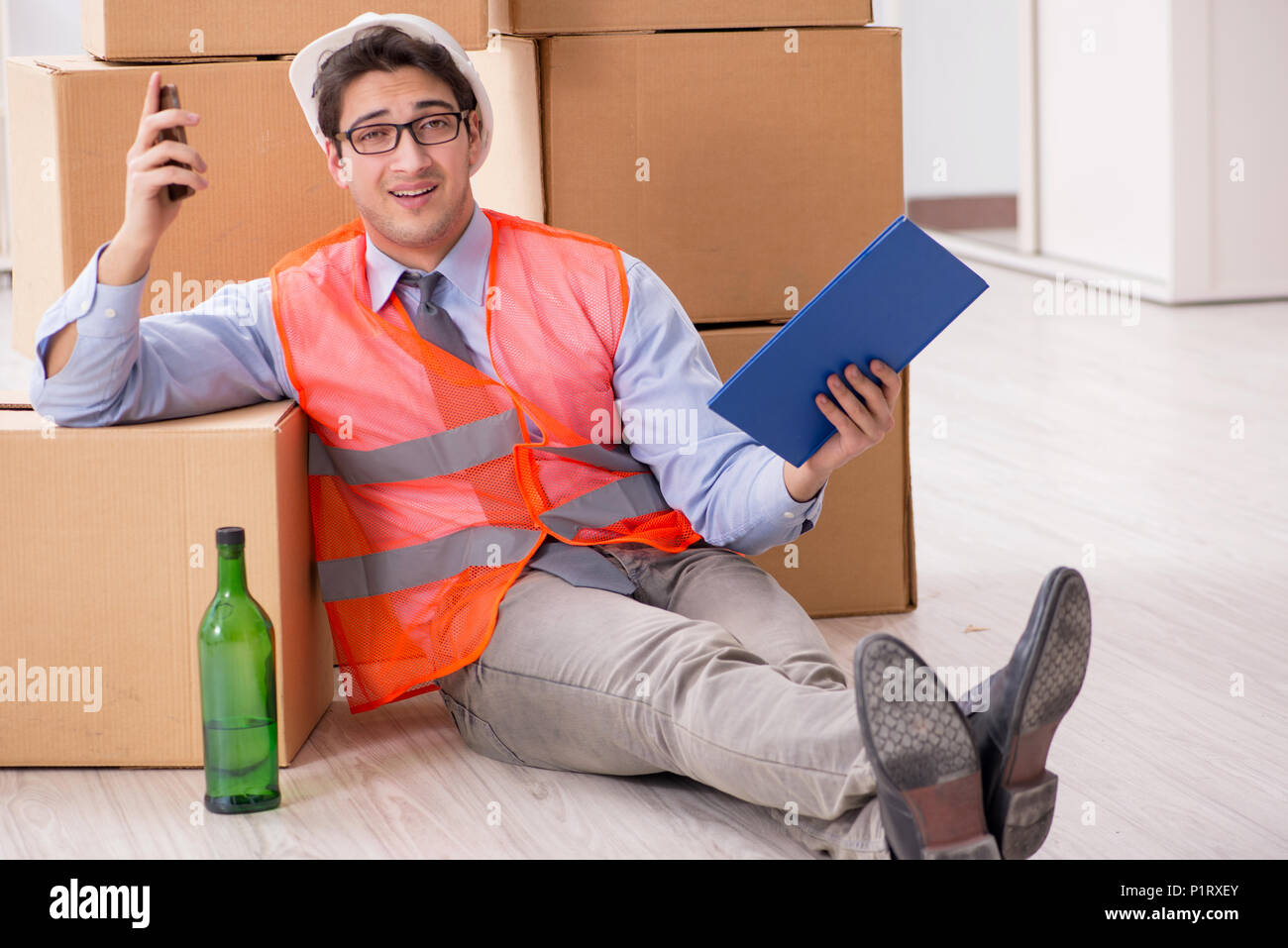 Delivery man drunk at work Stock Photo - Alamy