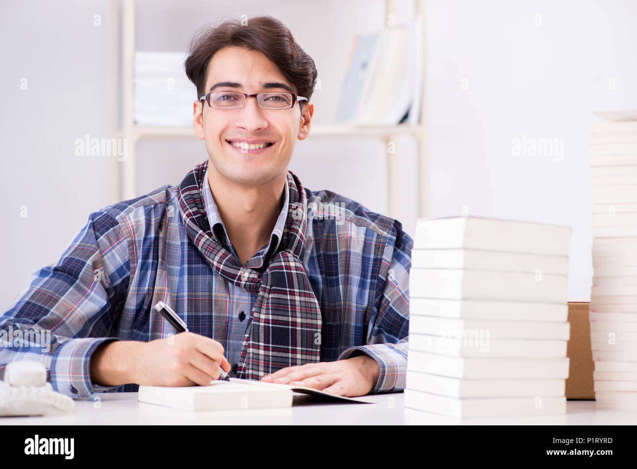 Writer presenting his books to public Stock Photo - Alamy