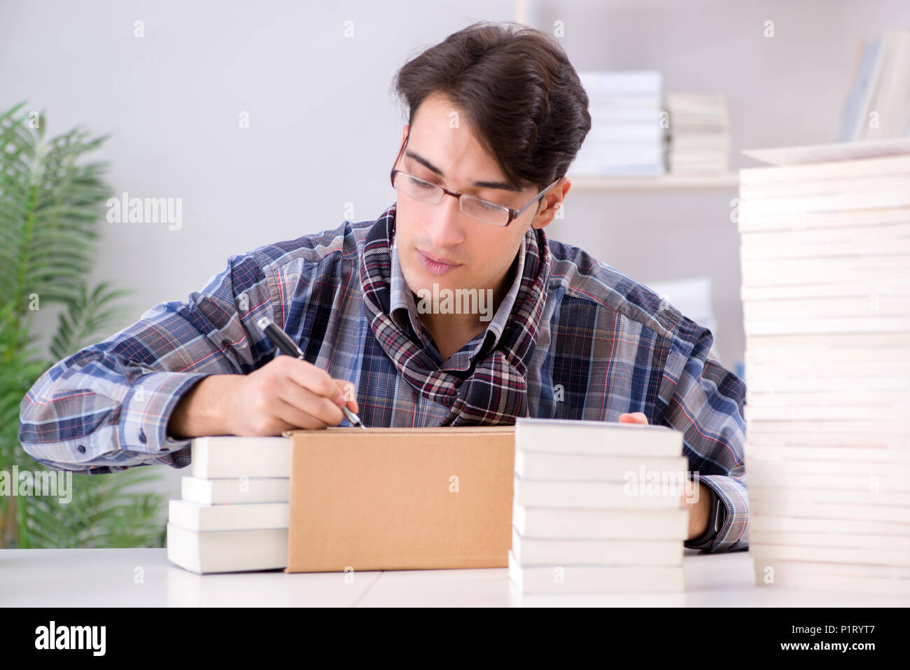 Writer presenting his books to public Stock Photo - Alamy
