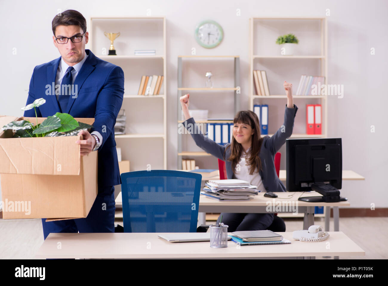 Person being fired from his work Stock Photo - Alamy