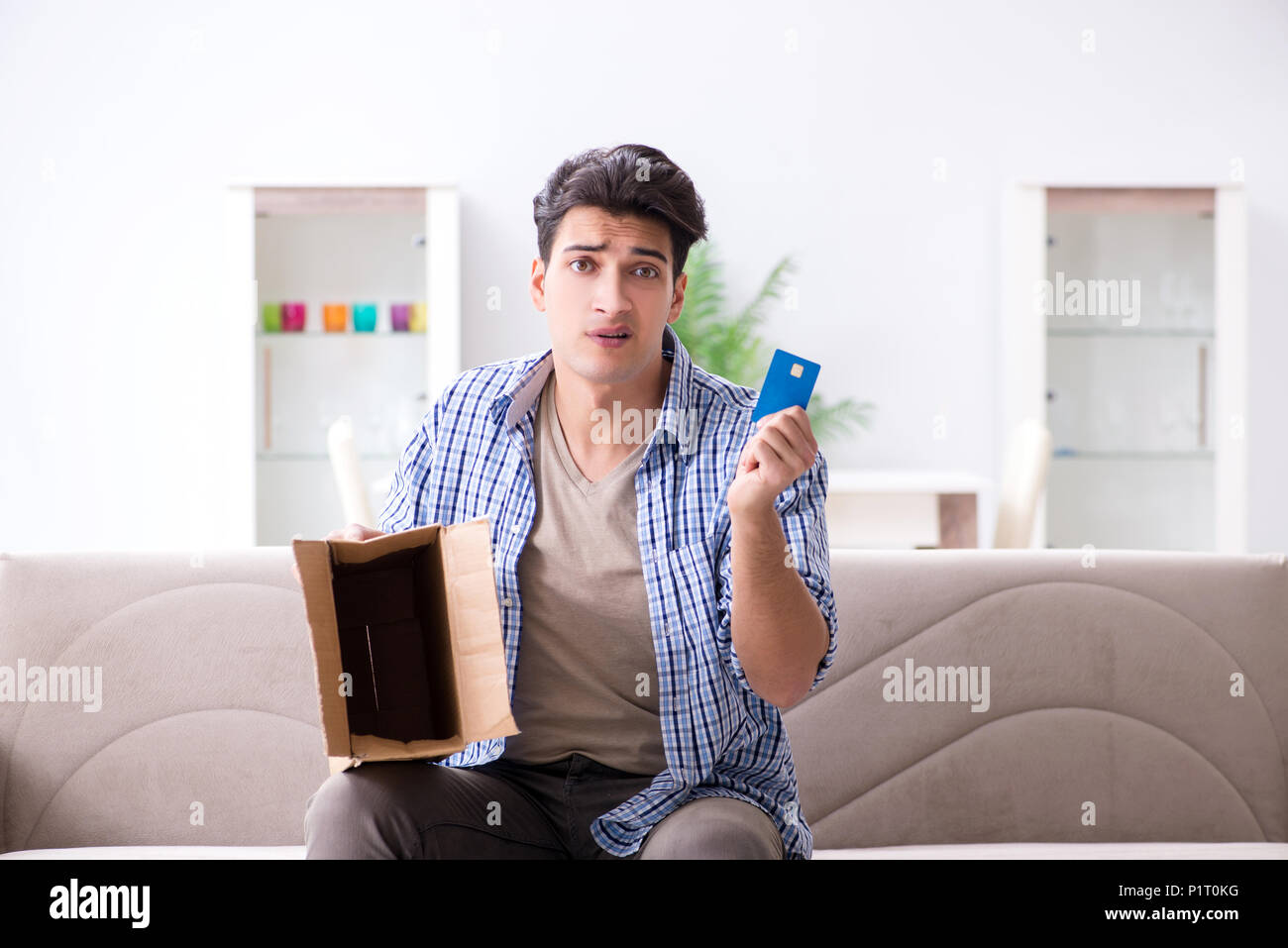 Man receiving empty parcel with stolen goods Stock Photo - Alamy