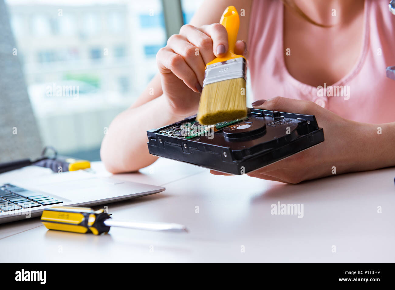 Hard drive repair and data recovery with restoration Stock Photo - Alamy