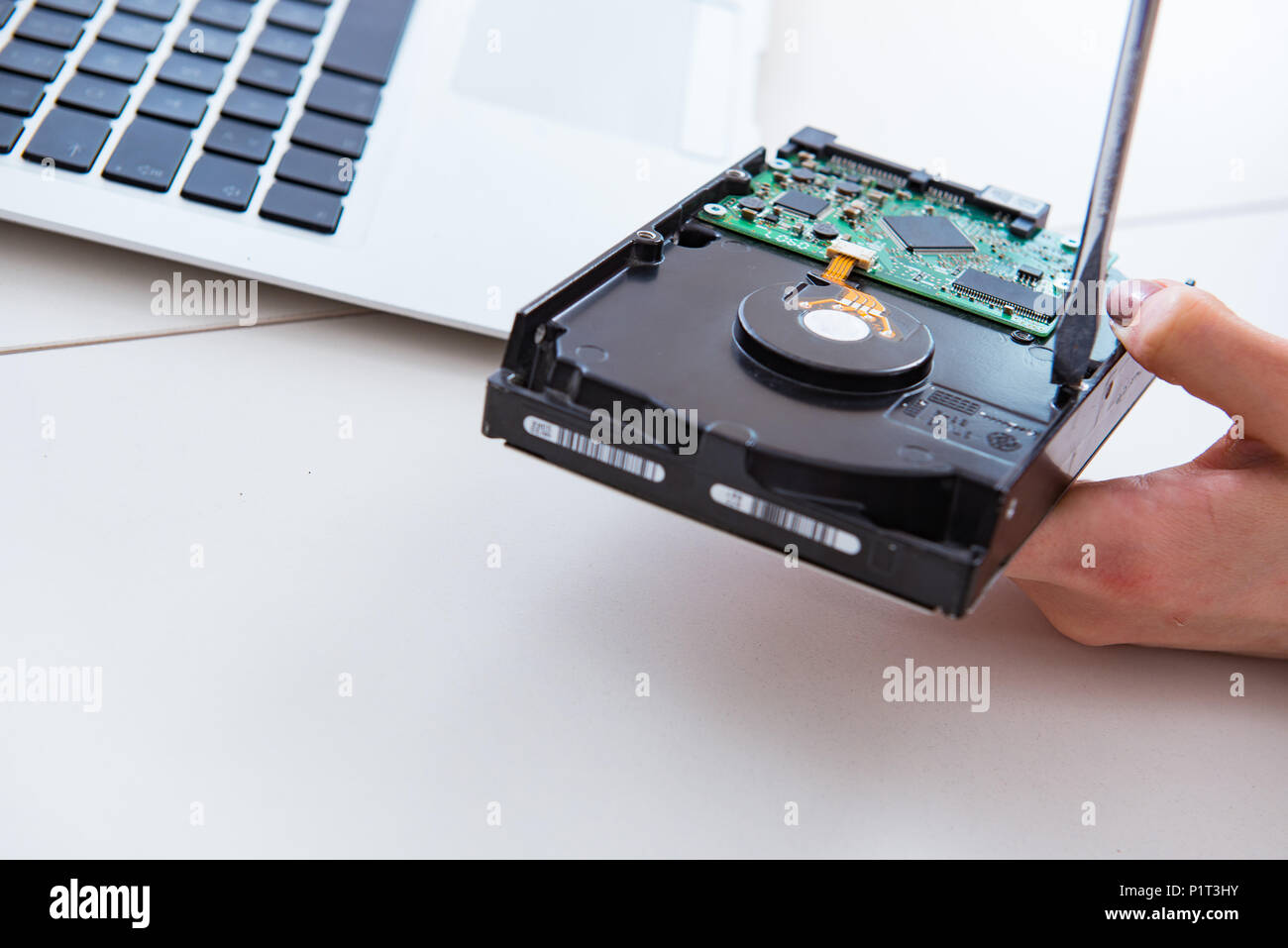 Hard drive repair and data recovery with restoration Stock Photo - Alamy
