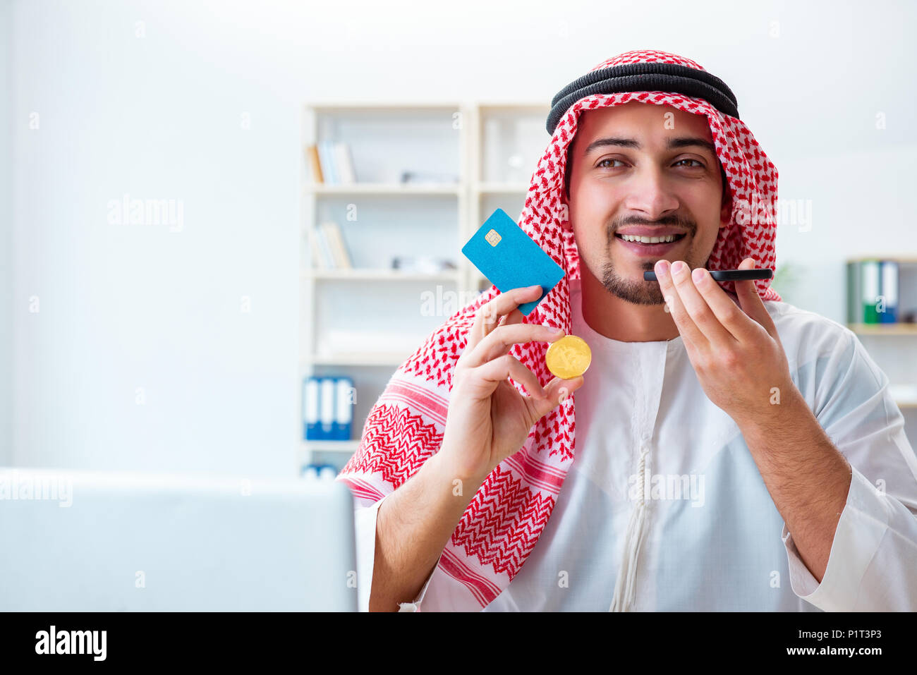 Arab man with bitcoin in cryptocurrency mining concept Stock Photo - Alamy