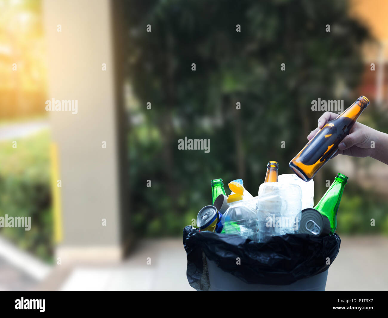man hand putting plastic reuse for recycling concept environmental ...