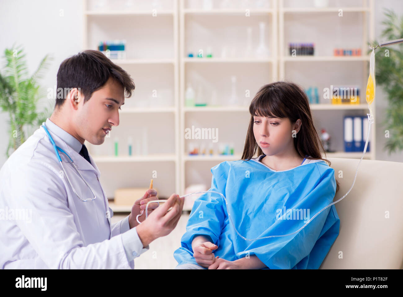 Doctor discussing blood transfusion with patient Stock Photo - Alamy