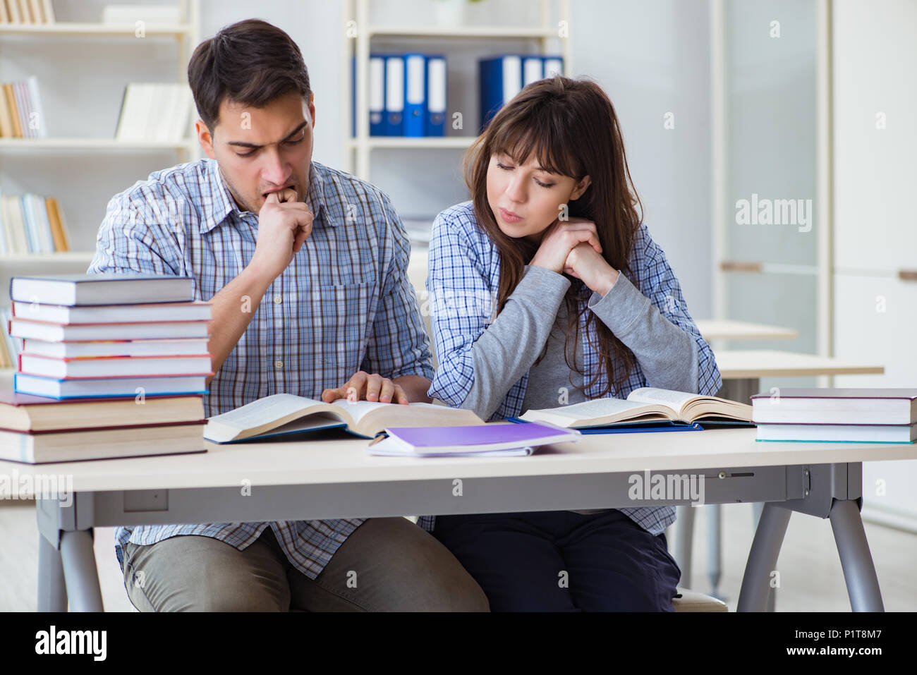 Students sitting and studying in classroom college Stock Photo - Alamy