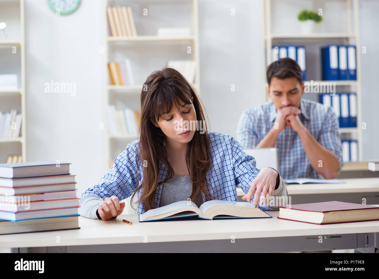 Students sitting and studying in classroom college Stock Photo - Alamy