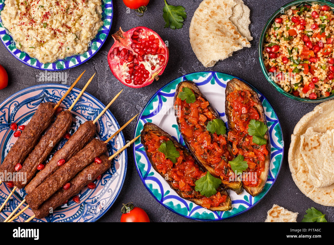 Classic kebabs, tabbouleh salad, baba ganush and baked eggplant with ...