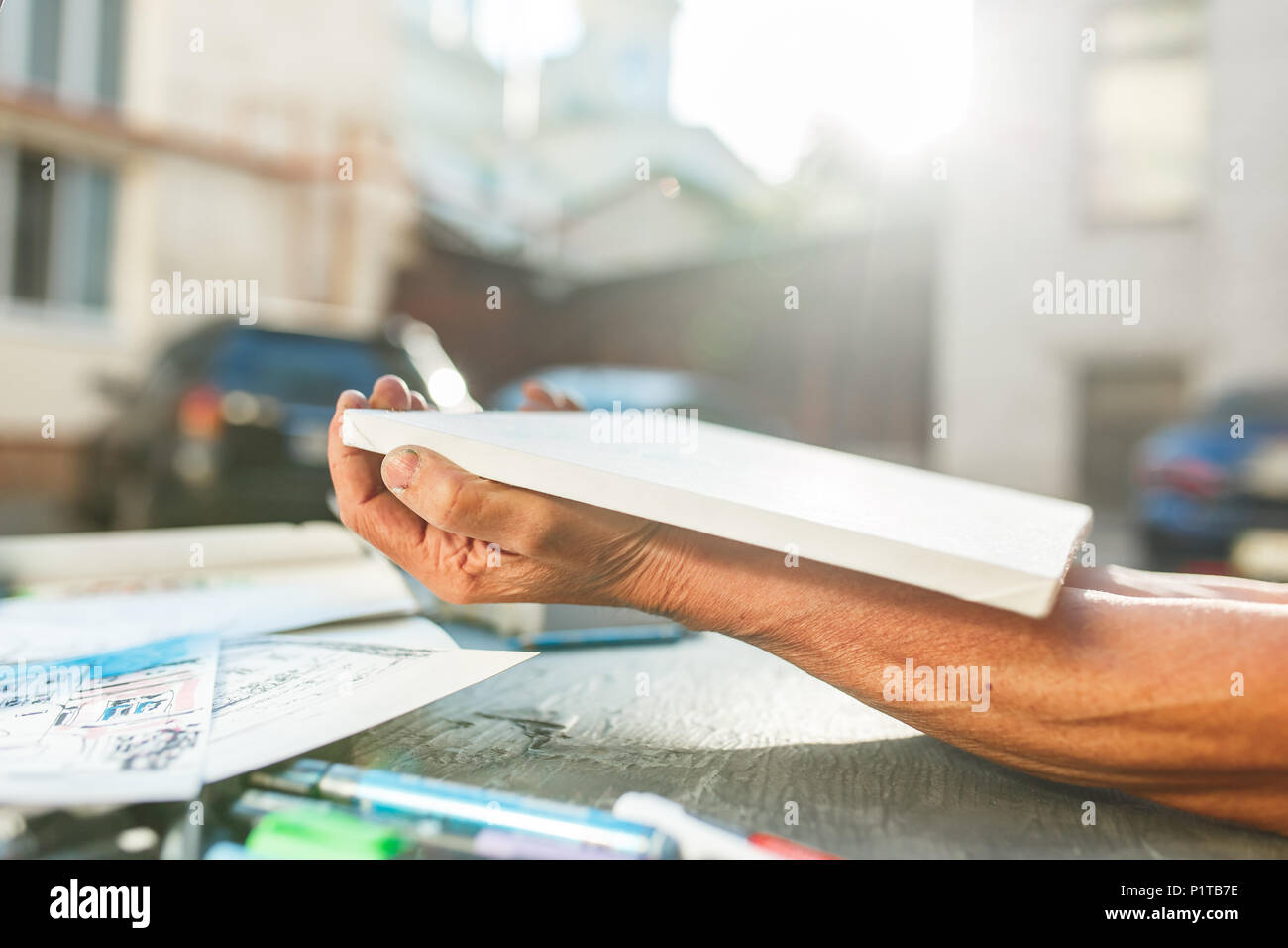 Close up man working of Architect sketching a construction project on ...