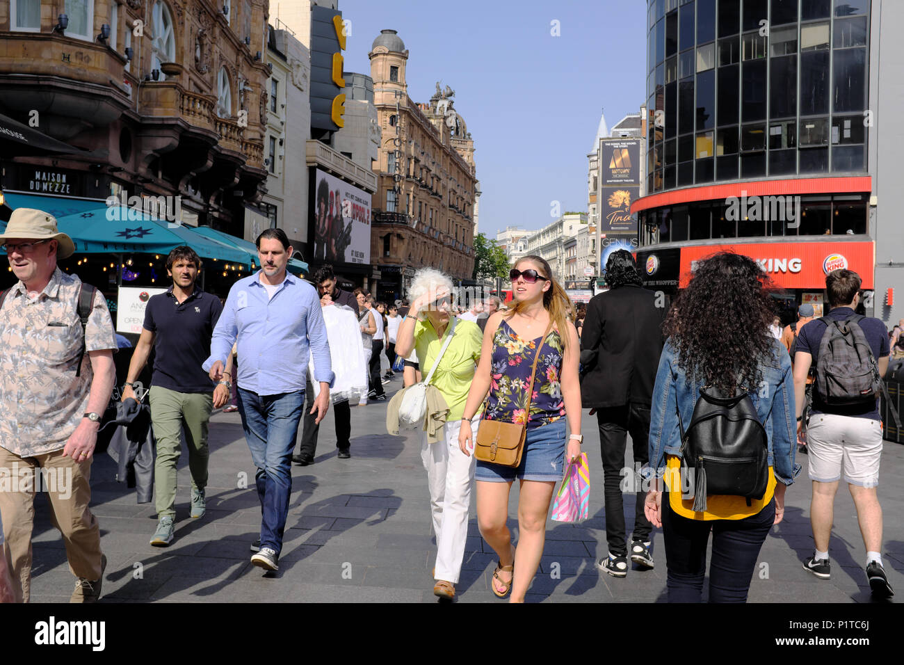 People in Leicester Square, London, England, UK Stock Photo - Alamy