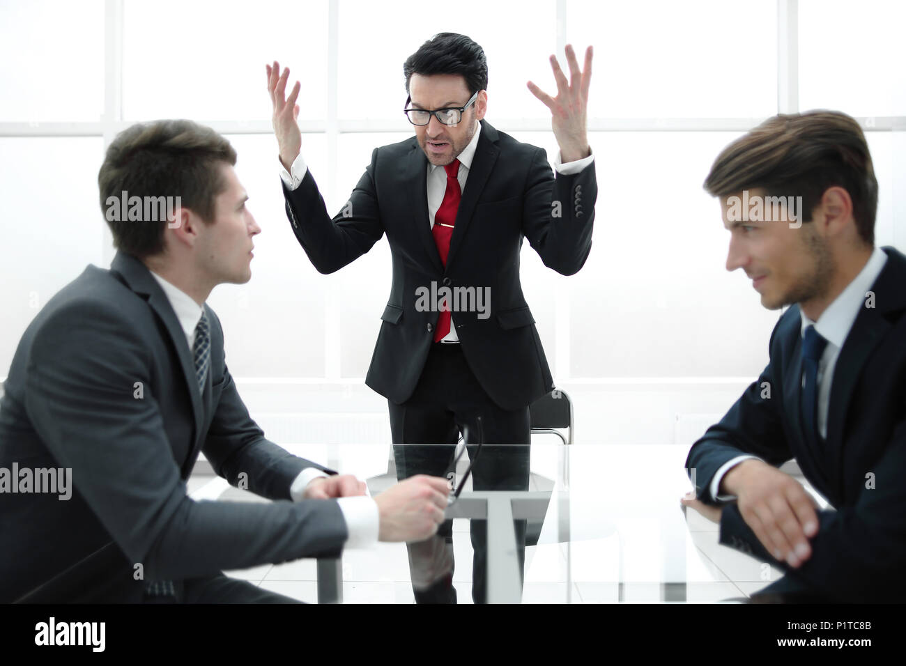 strict boss holds a working meeting with managers Stock Photo - Alamy