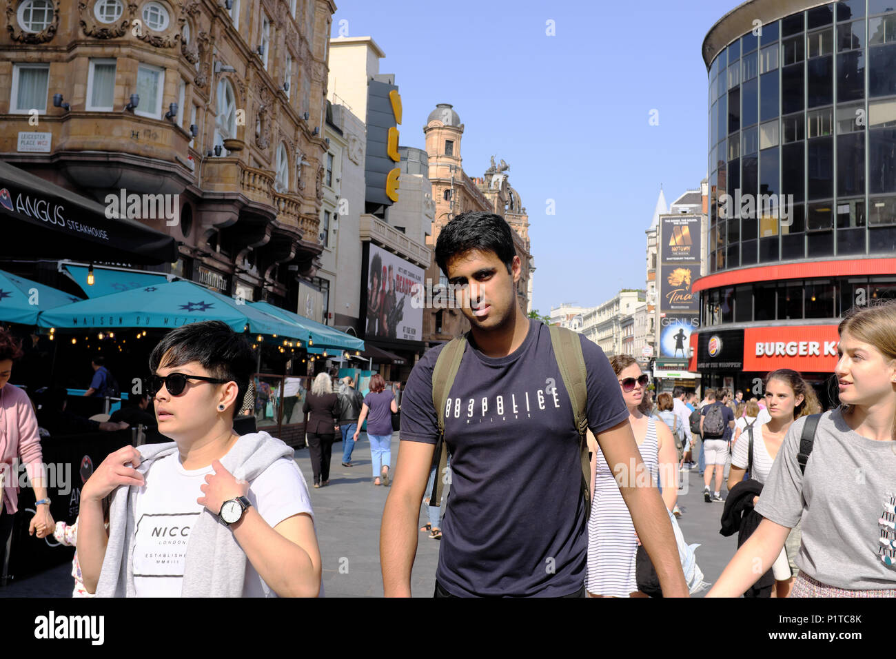 People in Leicester Square, London, England, UK Stock Photo - Alamy
