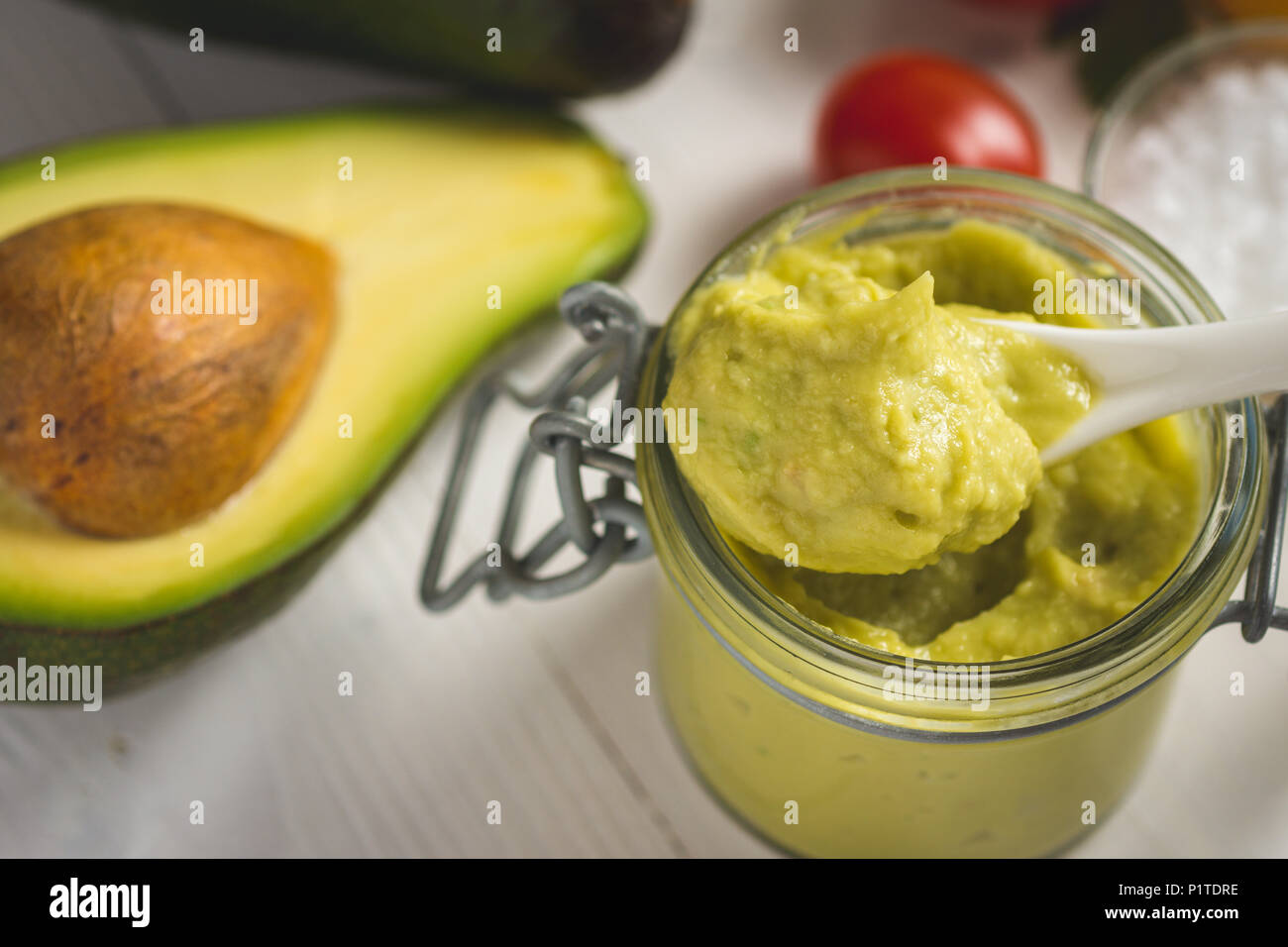 Homemade Green Avocado Spread in Jar. Vegan Raw and Healthy Fresh Food ...
