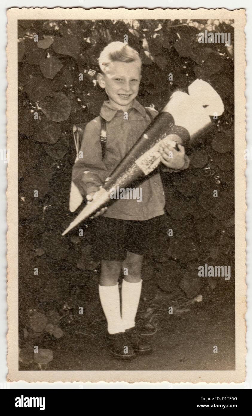 GERMANY- CIRCA 1940s: Vintage photo shows pupil boy with "Schultute" or ...